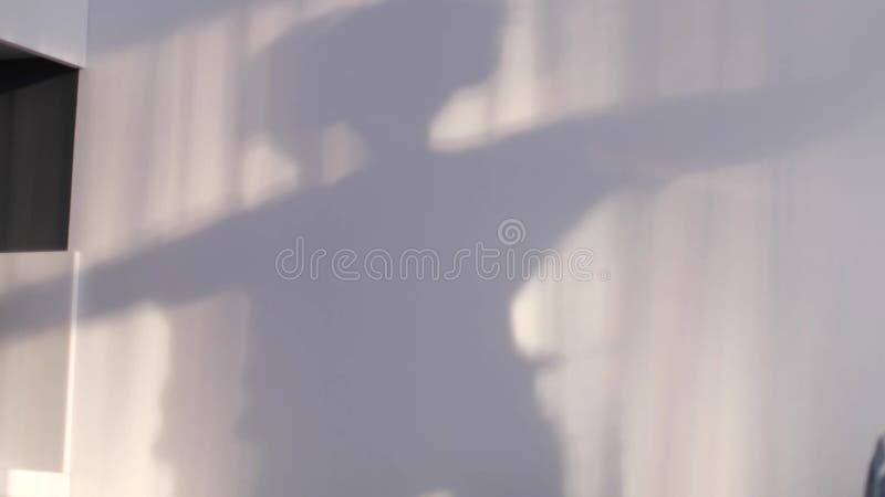 Defocus Little Boy Playing with Shadows on the Wall. Shadow of a ...