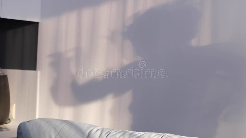 Defocus Little Boy Playing with Shadows on the Wall. Shadow of a ...