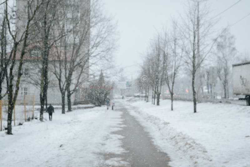 Defocus Winter Street, Falling Snow, Day Outdoors. Sidewalk, People and ...