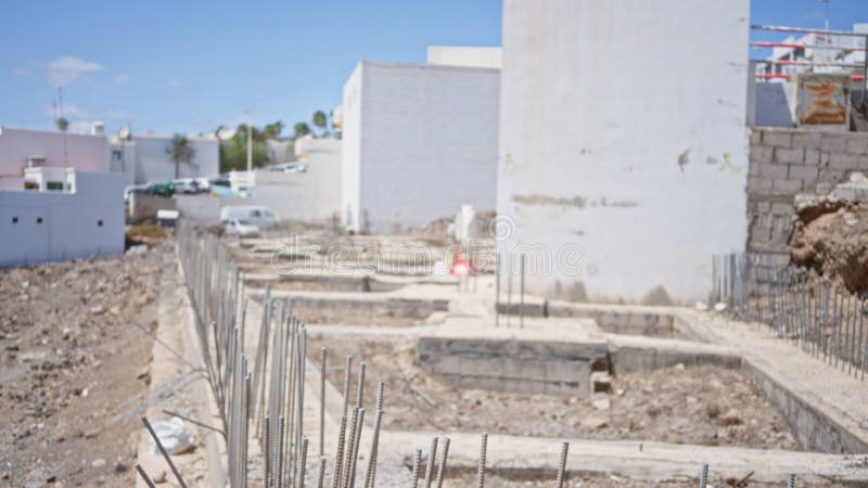 Defocused Construction Site with Blurry Building Foundations and ...