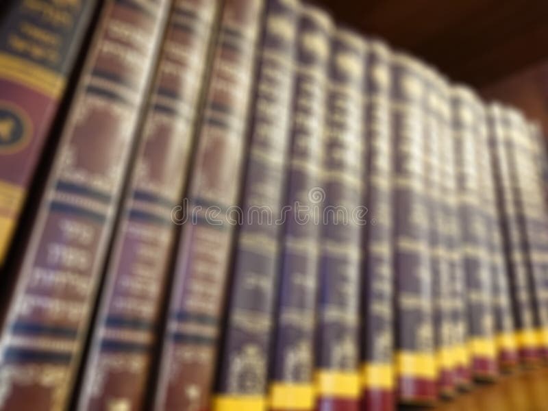 Defocused Image. Multi-colored Books on the Bookshelf in the Library ...