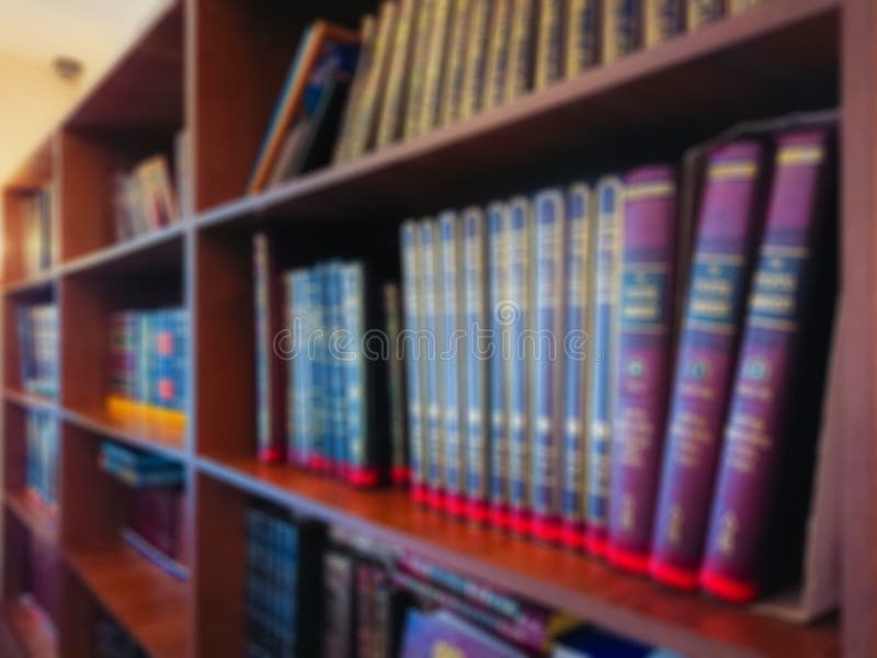 Defocused Image. Multi-colored Books on the Bookshelf in the Library ...