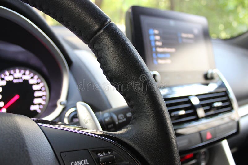 Defocused Monitor on the Central Panel of the Car Displays the Menu ...