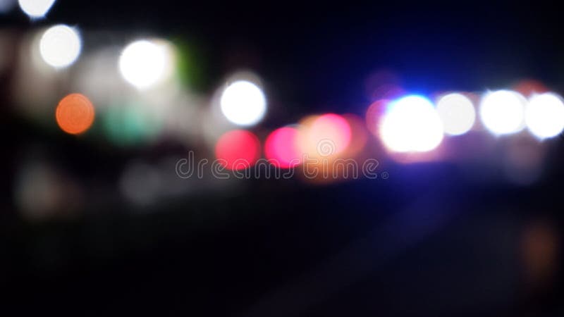 Defocused a Quiet Night View with the Dim Lights of a Distant City ...