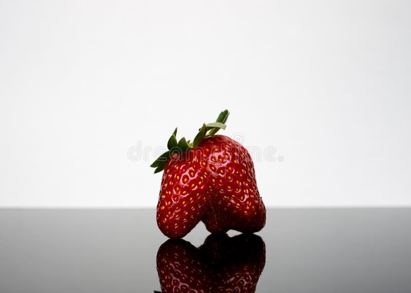 Deformed Strawberry stock photo. Image of strange, green - 67499260