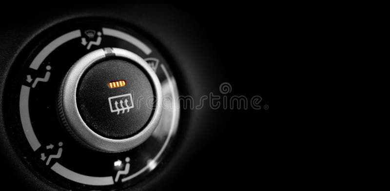 Defrost Button in Car with Orange Light on Black Background Stock Image ...