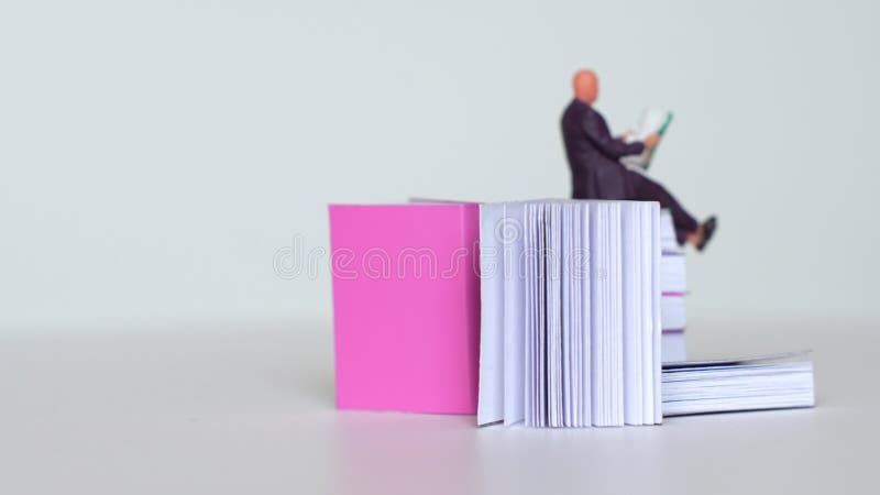 360 Degree Miniature Scene of Businessman Figurine Reading Documents on ...