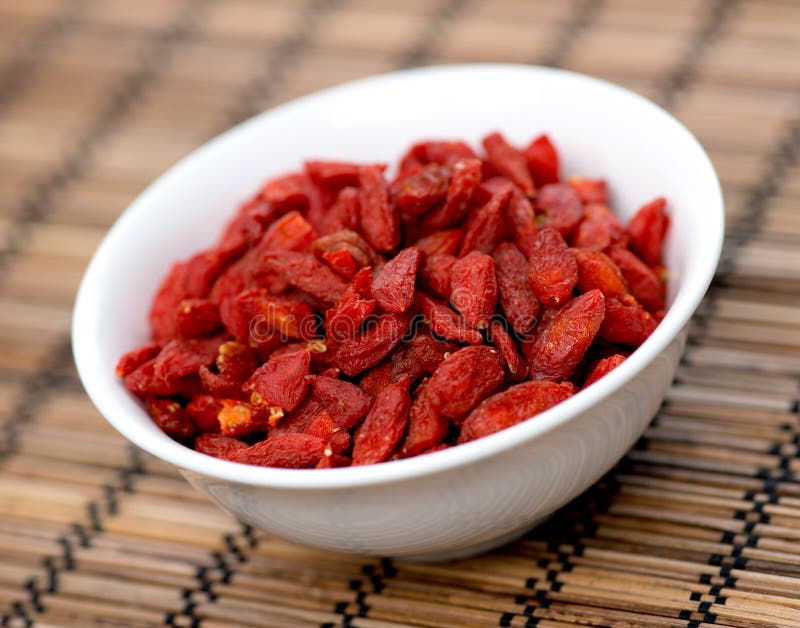 Red Dehydrated Goji Berries and Goji Berry Powder Isolated on White ...