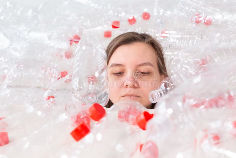 Dehydrated Sick Woman is Lying in a Pile of Plastic Bottles ...