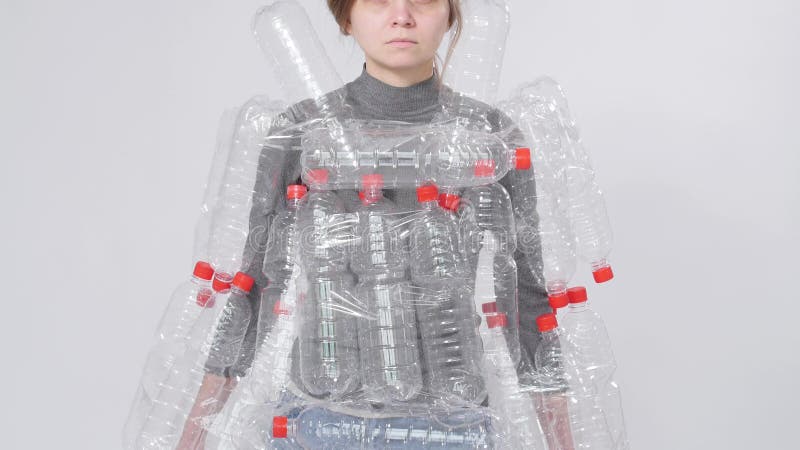 Dehydrated Sick Woman is Lying in a Pile of Plastic Bottles ...