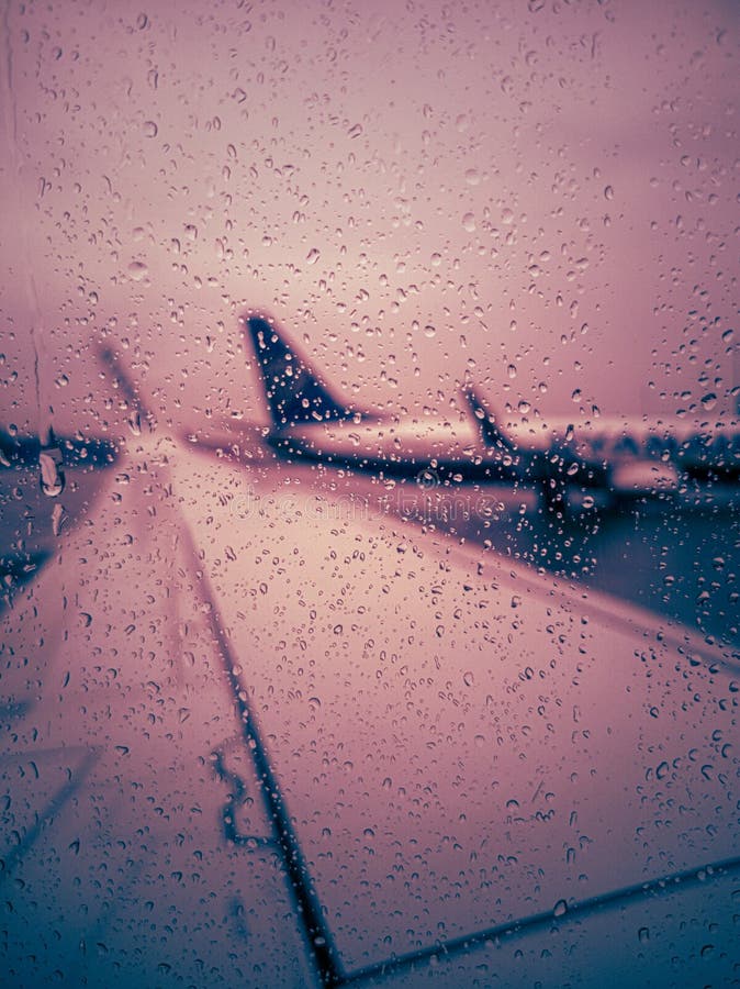 Delayed Flight, Raindrops on the Plane Window, Bad Weather at the ...