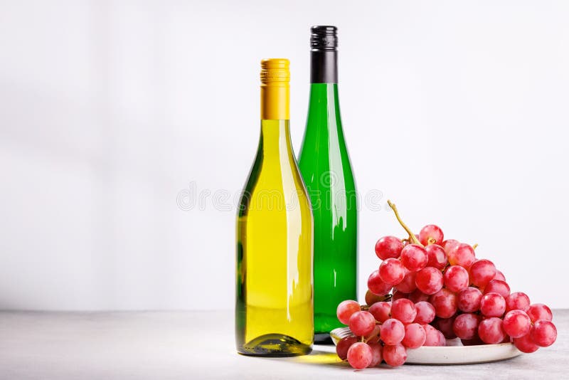 A Delectable Arrangement of Various Wine and Grapes Stock Photo - Image ...
