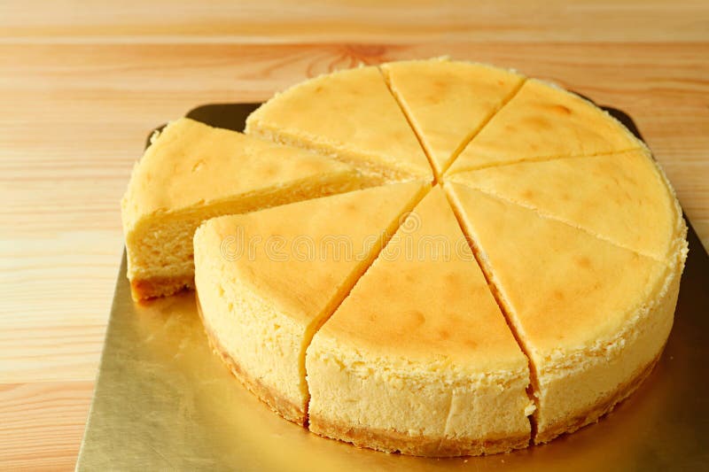 Baked Cheesecake with a Slice Cut from Whole Cake Stock Image - Image ...