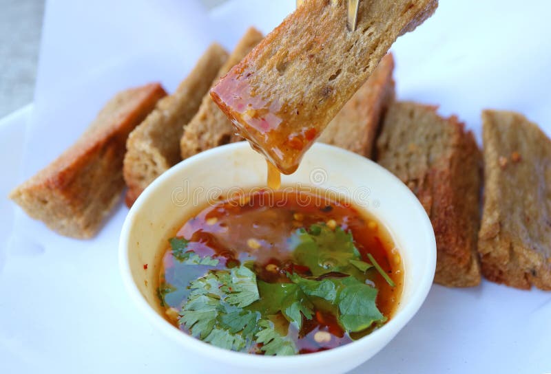 Crispy Fish Crackers or Kropek Dipping Sweeten Chili Sauce Stock Photo ...
