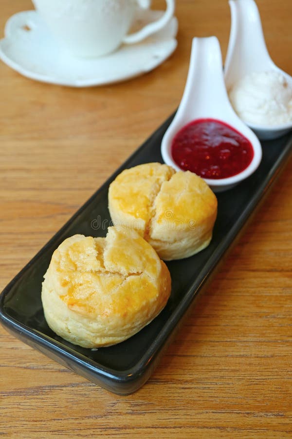 Scones with Raspberry Jam and Whipped Cream Stock Image - Image of ...