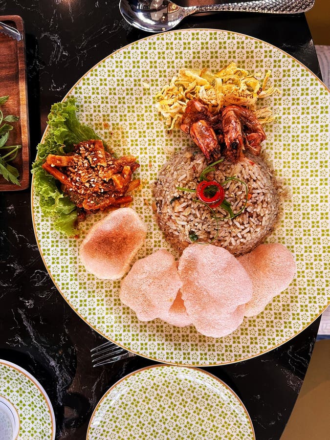 Delicious Asian Cuisine with Fried Rice, Prawns, and Accompaniments on ...