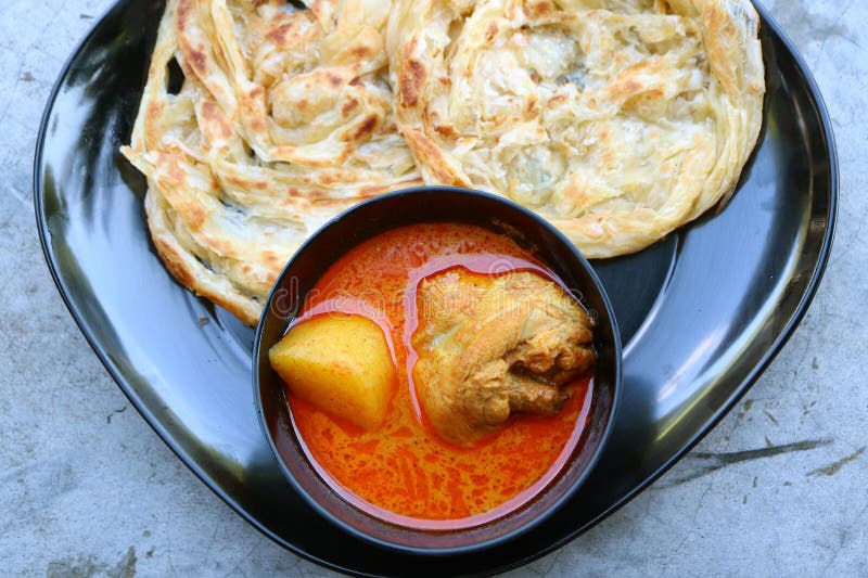 Spicy Indian Chicken Curry with Roti Flatbread Stock Image - Image of ...