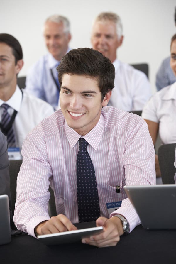Delegates Listening To Presentation at Conference Stock Image - Image ...