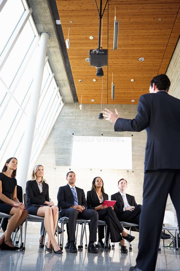 Delegates Listening To Speaker at Conference Stock Photo - Image of ...