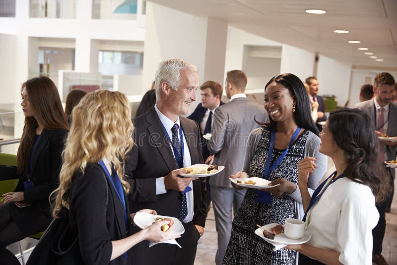 Delegates Networking During Conference Lunch Break Stock Image - Image ...