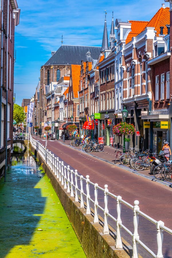 DELFT, NETHERLANDS, AUGUST 6, 2018: Typical Dutch Buildings Alongside a ...