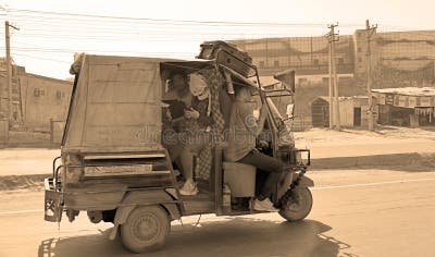 An Auto Rickshaw is a Motorized Version of the Pulled Rickshaw ...