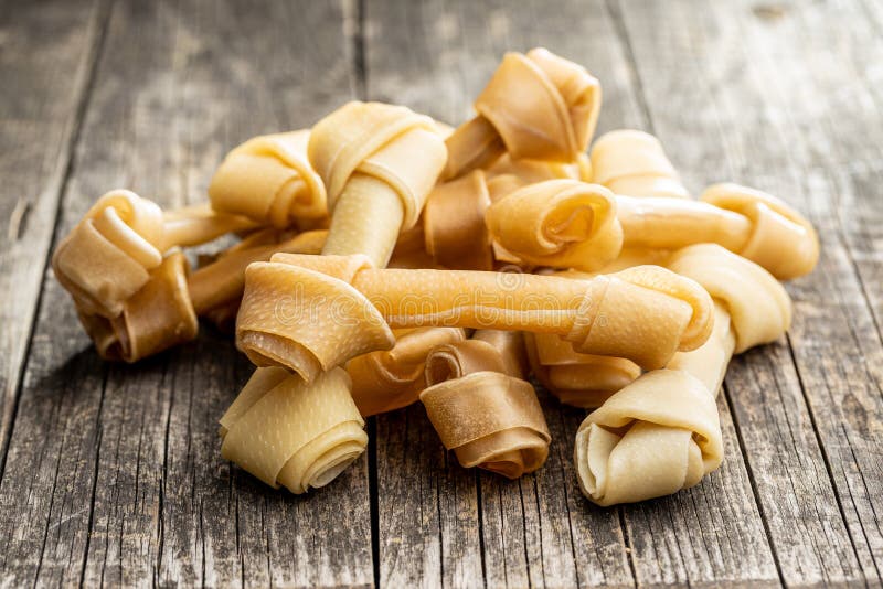 Delicacy for Dogs. Chewing Bone for Dog Stock Photo - Image of closeup ...