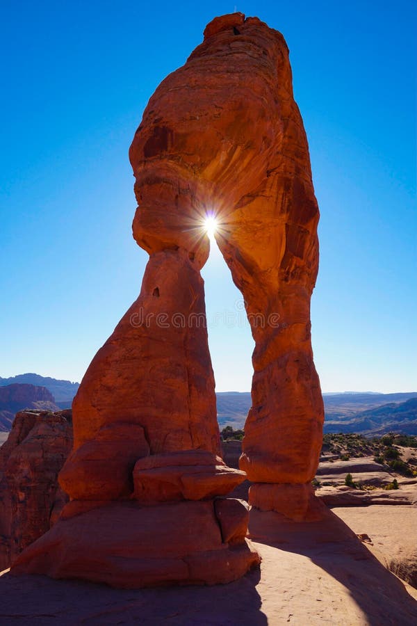 Delicate Arch with the Sun Setting Stock Photo - Image of famous ...