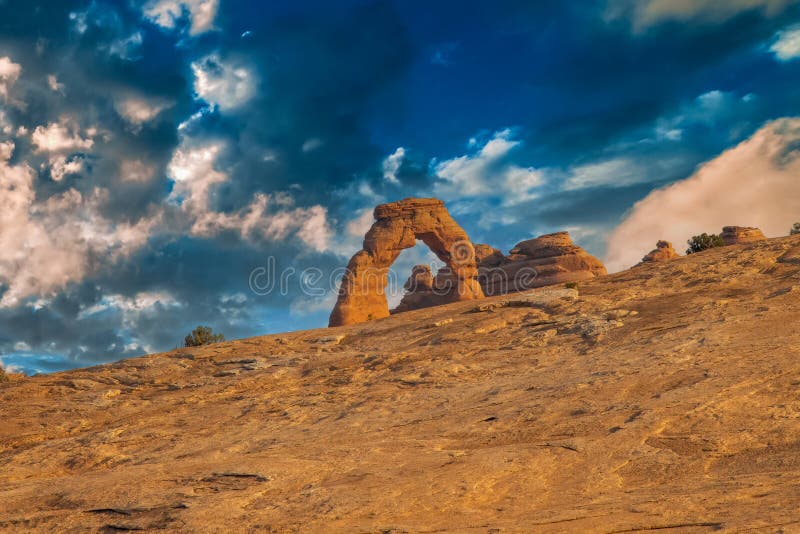 Delicate Arch at Sunrise in Arches National Park Stock Photo - Image of ...