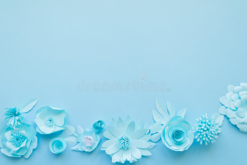 Blue Paper Flowers on Blue Background. Cut from Paper Stock Photo ...