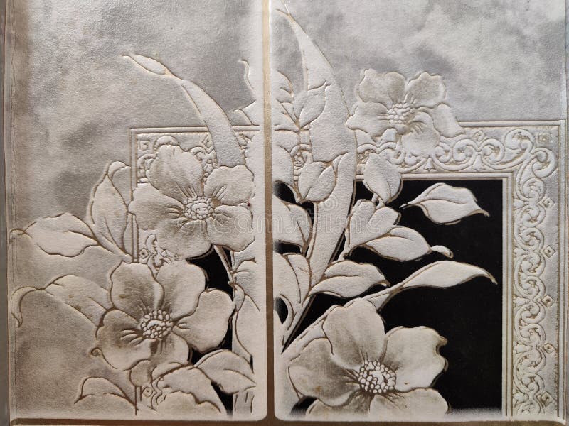 Delicate Embossed Floral Artwork Featuring Intricate Details and ...