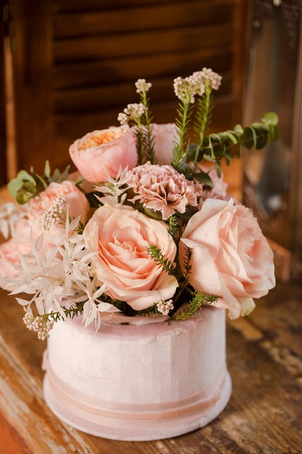 A Delicate Flower Composition of Pink Roses and Carnations Stock Image ...