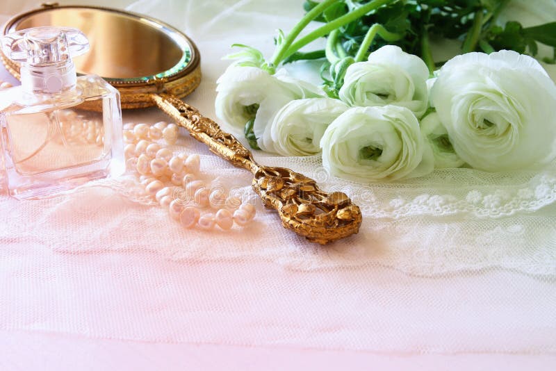 Delicate Lace Fabric, Hand Mirror and White Flowers Stock Photo - Image ...