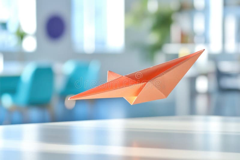 A Delicate Origami Paper Airplane in Flight, Suspended Above a Table ...
