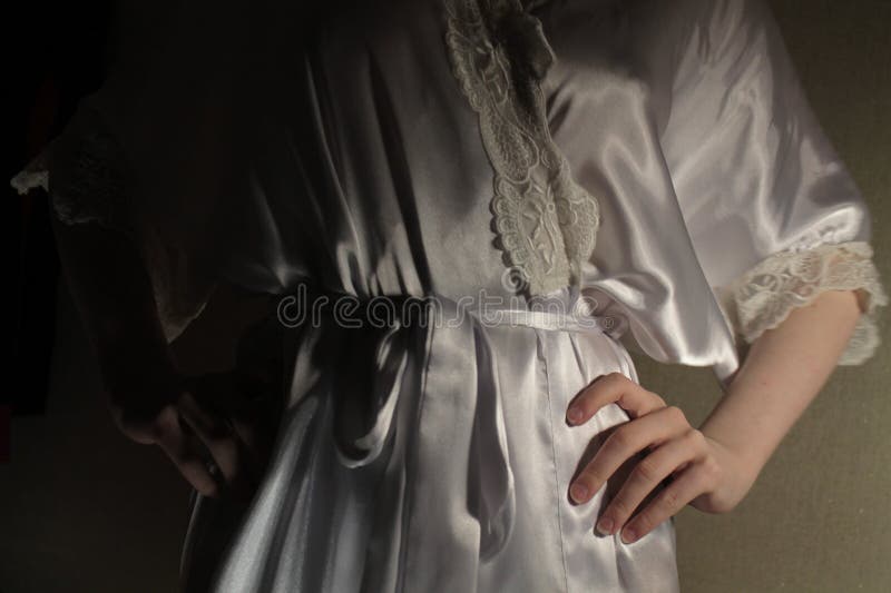 Delicate Outlines of a Female Body in a White Silk Robe Stock Image ...