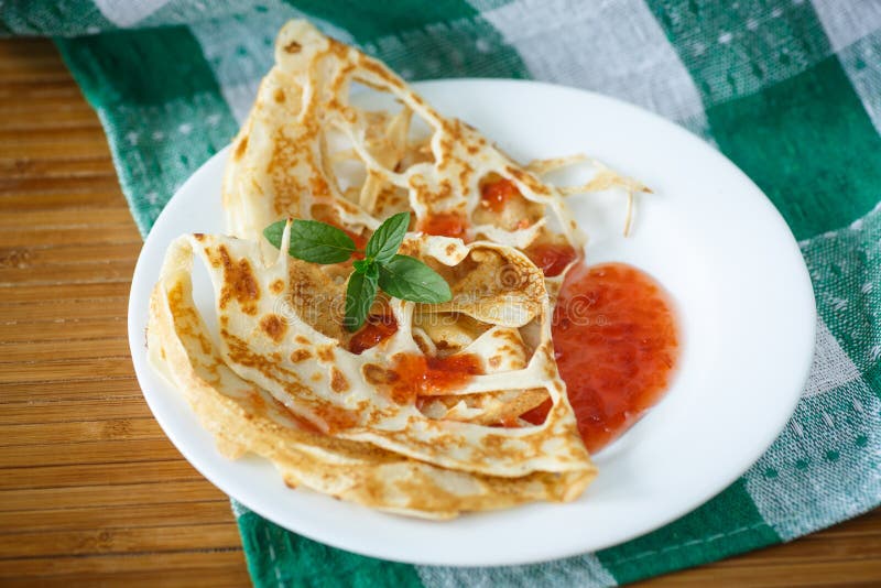 Delicate pancakes with jam stock photo. Image of crepes - 44839680