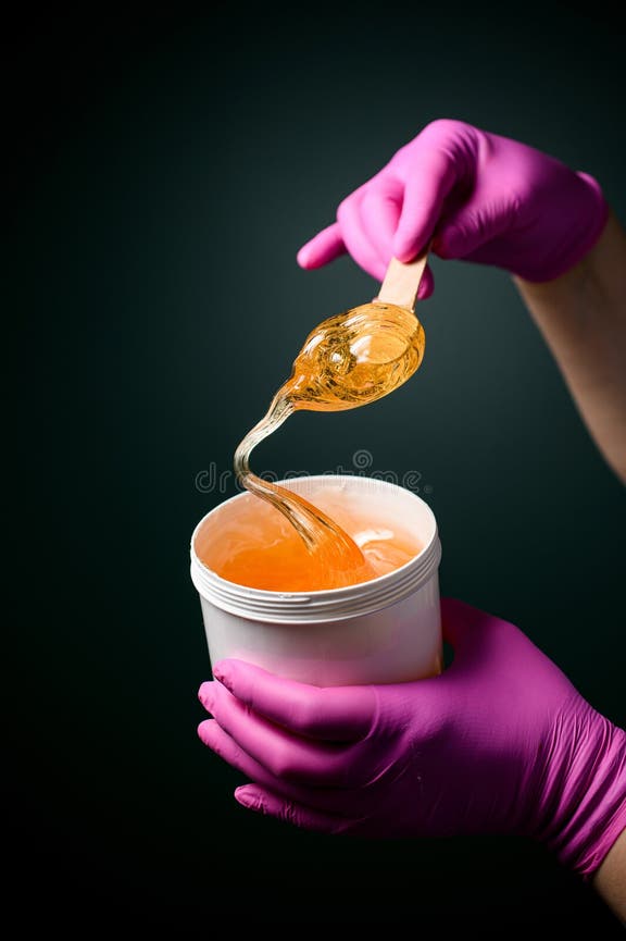 Delicate Paste for Hair Removing in a Container on a Dark Background ...