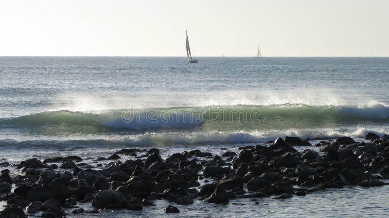 Delicate waves stock image. Image of waves, boat, beach - 51595487