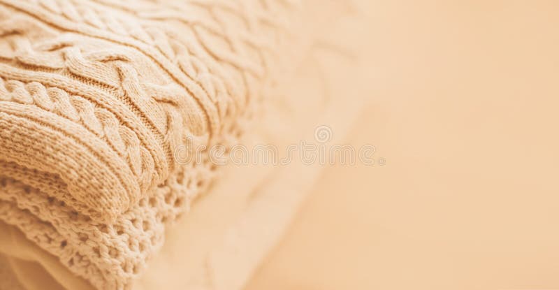 Delicate White Warm Wool Sweaters with Patterns are Stacked in a Pile ...