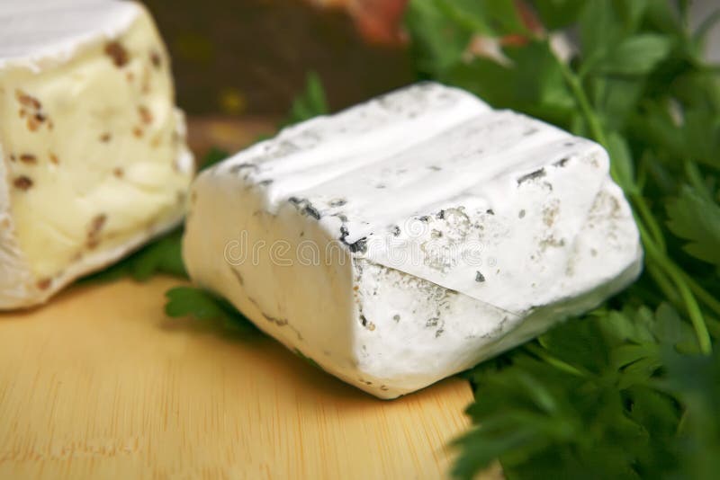 Delicatessen cheeses stock image. Image of gourmet, seed - 9784181