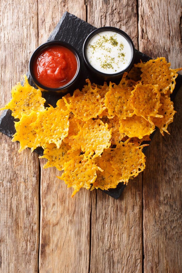 Delicious Appetizer of Cheddar Cheese Chips with Herbs Served with ...