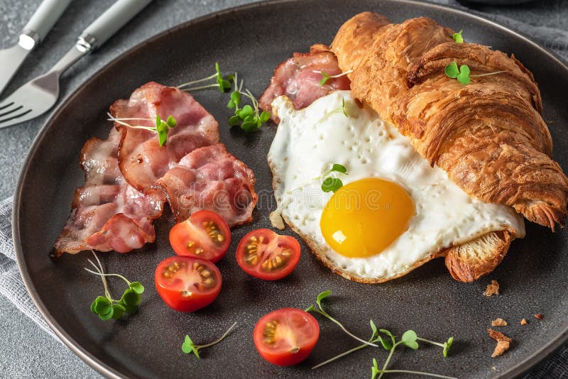 Delicious Appetizing Breakfast Close-up. Fried Egg, Bacon, Croissant ...