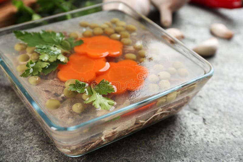 Delicious Aspic with Meat and Vegetables Served on Grey Table, Closeup ...