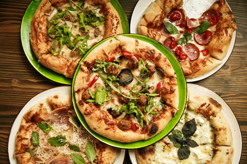 Delicious Assortment of Pizzas with Various Toppings, Perfect for ...
