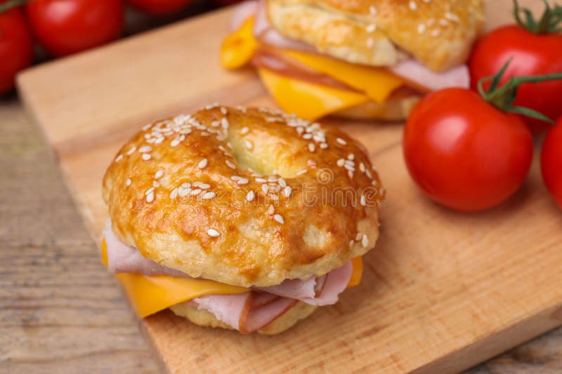 Delicious Bagels with Ham and Cheese on Table, Closeup Stock Image ...