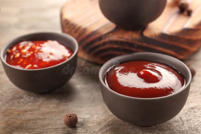 Delicious Barbecue Sauces in Bowls on Table Stock Image - Image of ...