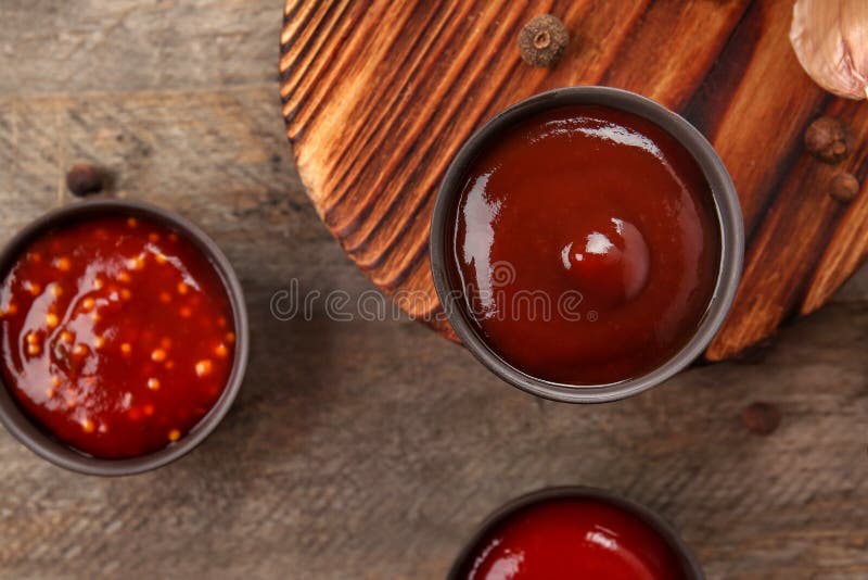Delicious Barbecue Sauces in Bowls on Table, Top View Stock Image ...