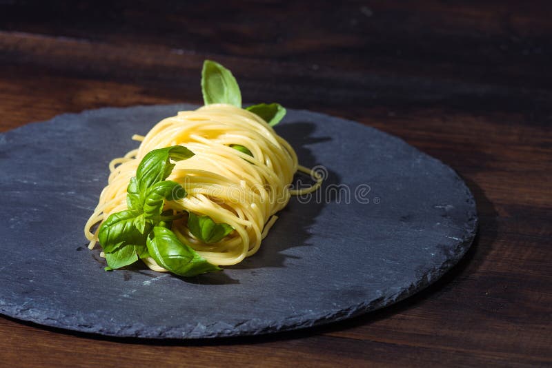 Delicious Basil Wrapped in Spaghetti Pasta Stock Photo - Image of ...