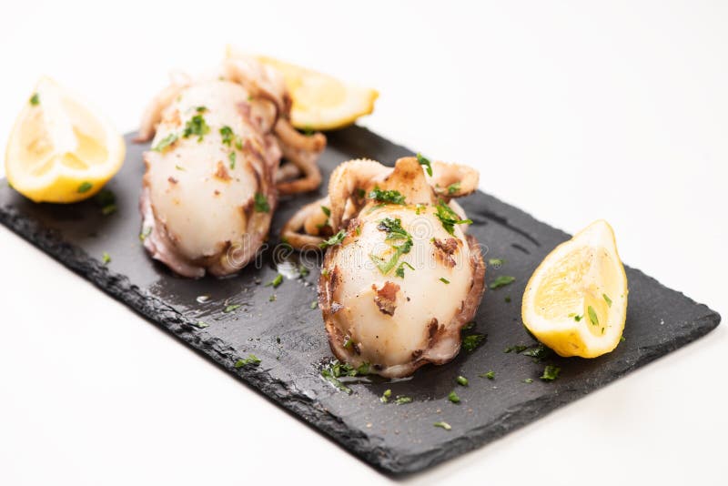 Delicious BBQ Cuttle Fish on a Stone Dish Stock Photo - Image of ...