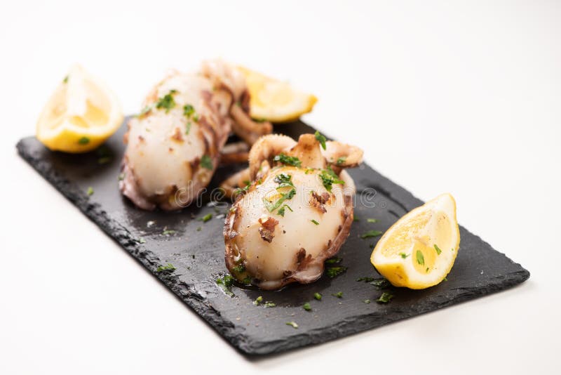 Delicious BBQ Cuttle Fish on a Stone Dish Stock Image - Image of cuttle ...